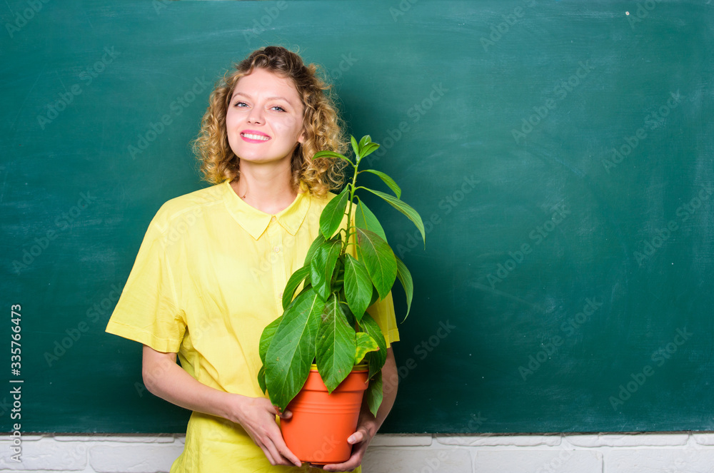 happy student girl with plant at blackboard. tree of knowledge. school ...