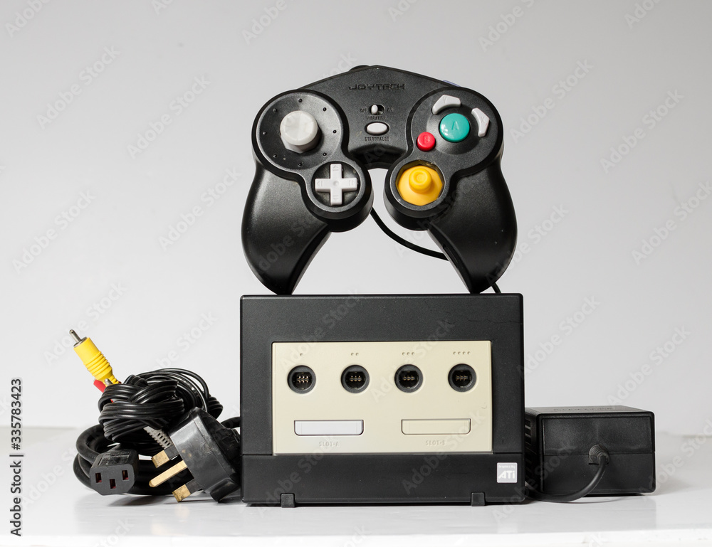 london, england 05/052019 A black Nintendo Game Cube Console on a white ...