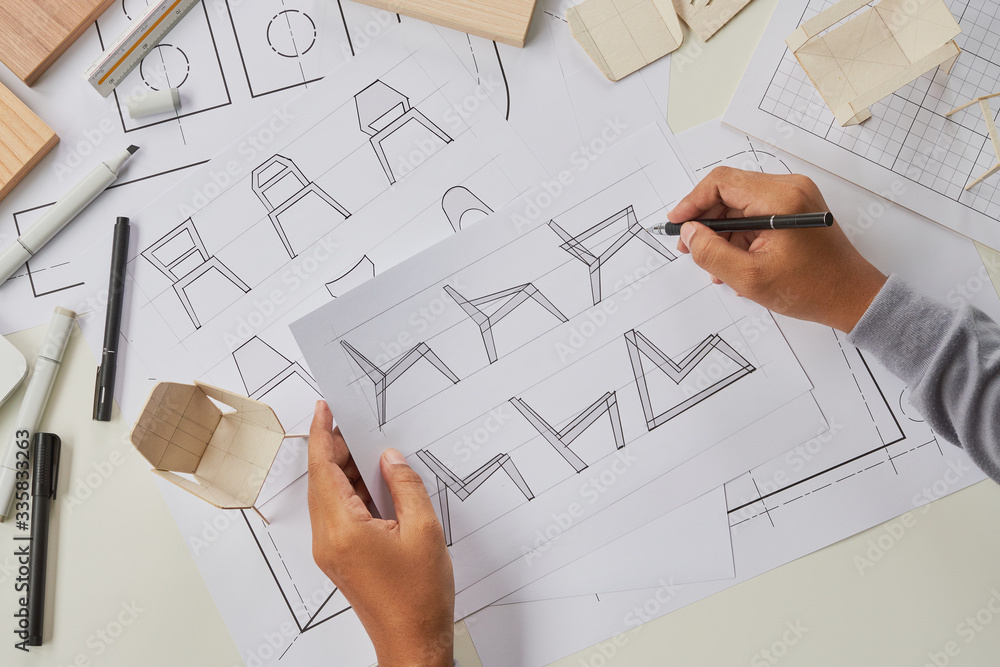 Designer sketching drawing design development product plan draft chair ...