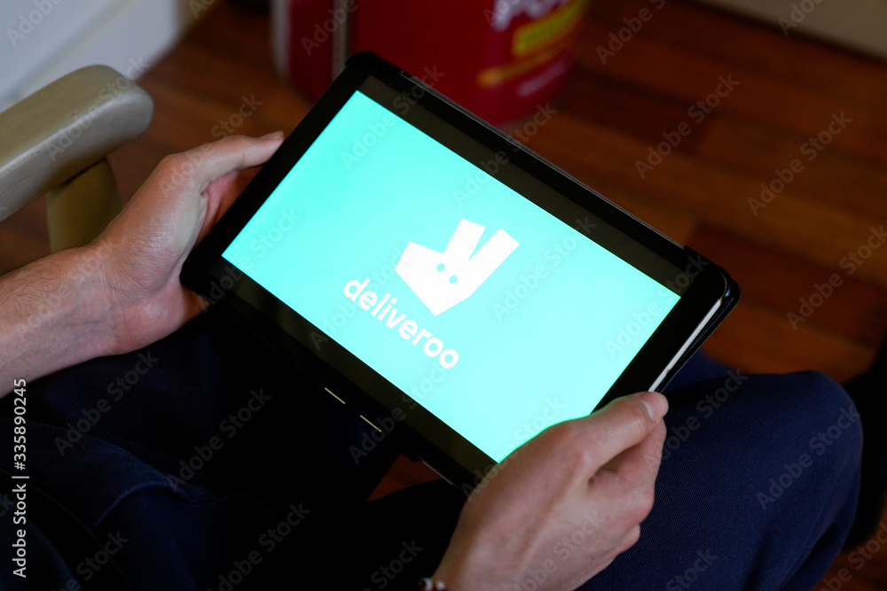 deliveroo sign logo screen tablet home application bike house food ...