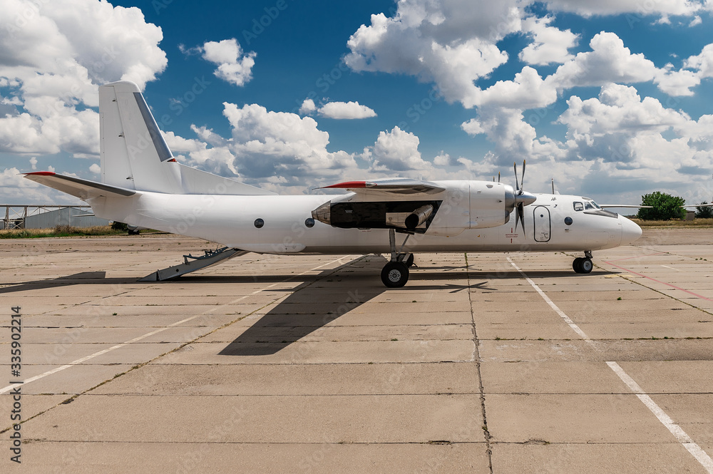 Exterior of AN-26 cargo aircraft parked at the airport Stock Photo ...