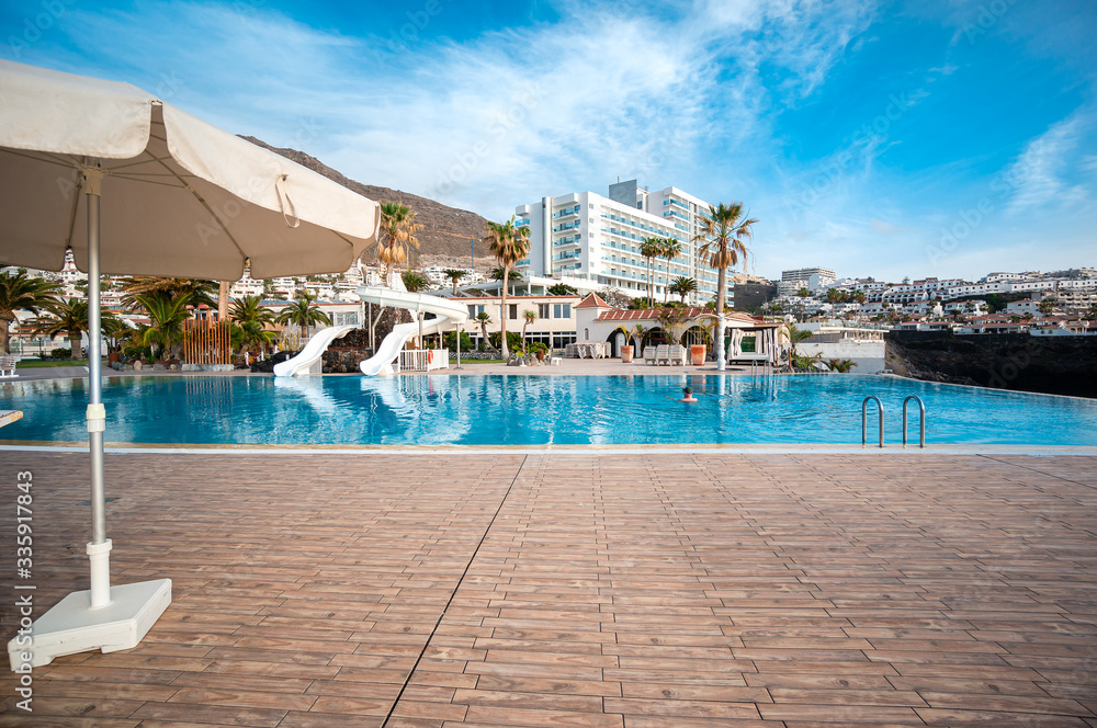 beautiful pool in a resort hotel, the concept of a summer holiday in a ...