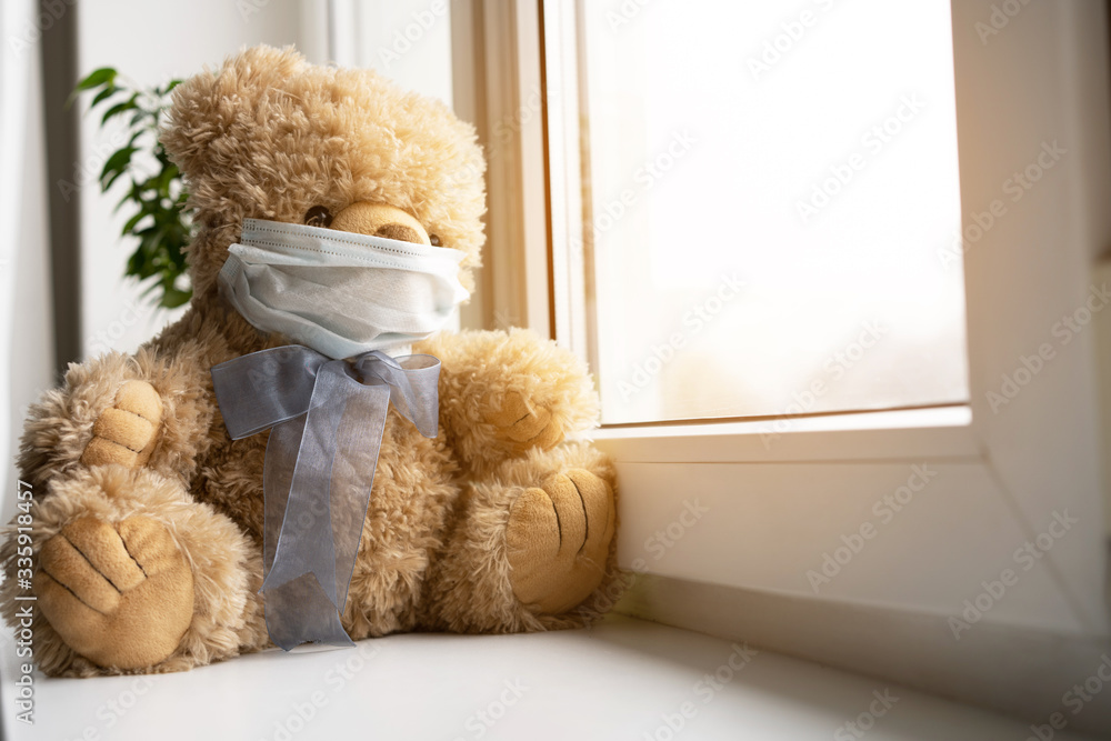 Coronavirus covid-19 and pollution protection concept. teddy bear doll ...