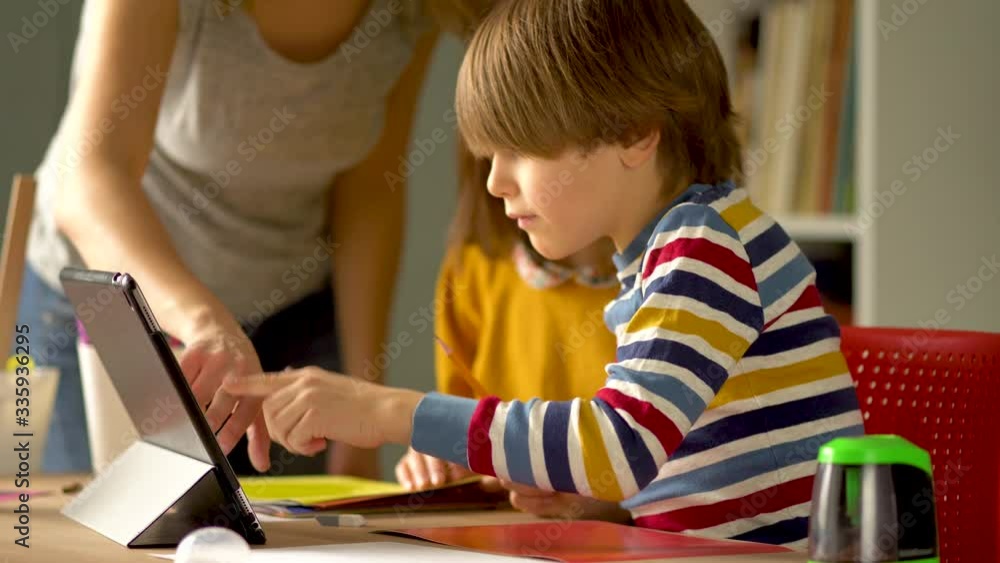 Cute children use laptop for education, online study, home studying ...