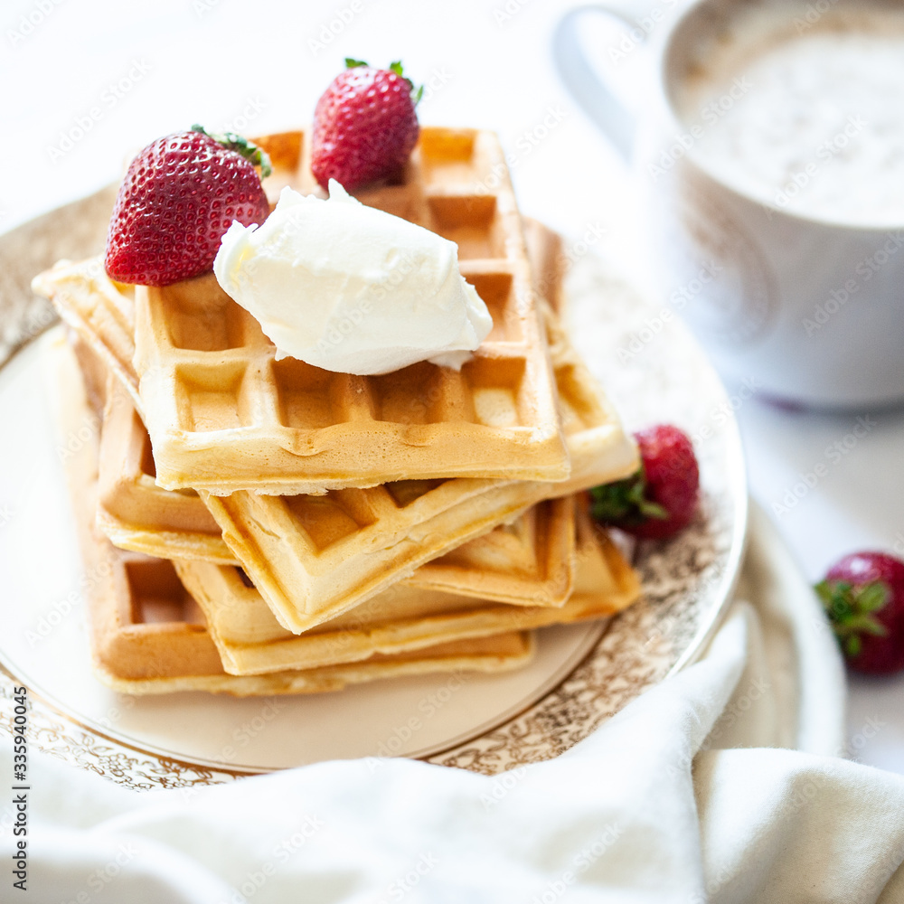 Torre de wafles con helado, frutillas y cafe Stock Photo | Adobe Stock