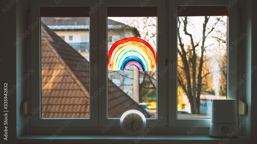Close-up photo of painting rainbow on window Stock Photo | Adobe Stock