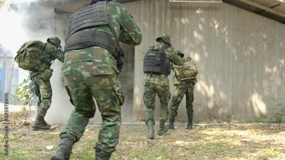 Asian army troop in war wearing military uniform and helmet painting ...