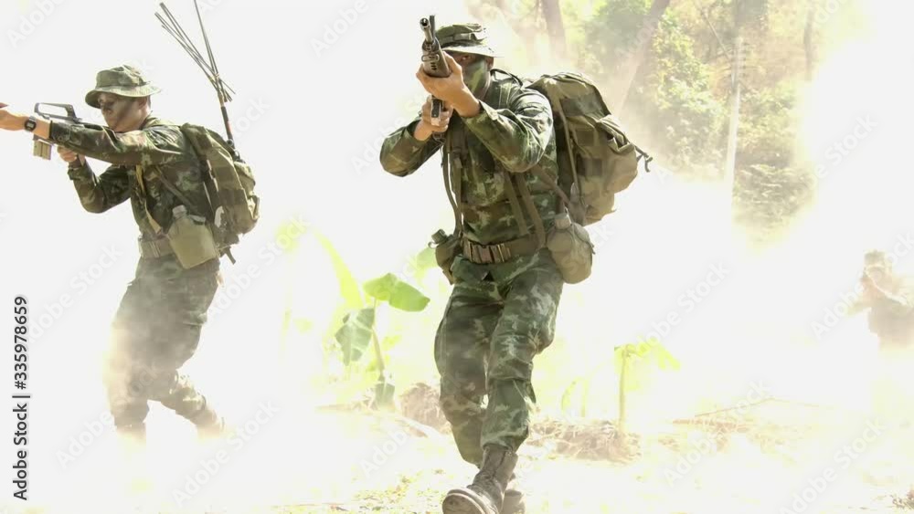 Asian army troop in war wearing military uniform and helmet painting ...