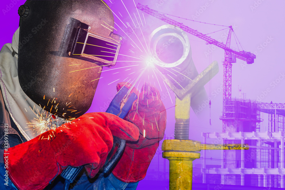 Welding construction site, Male in face mask welder, close up welding ...