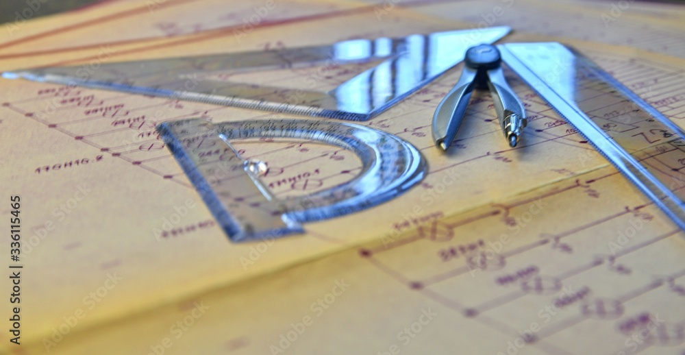 Electrical engineer workplace - electrotechnical project, rulers, and ...