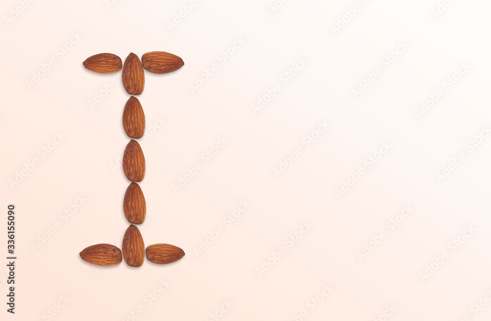 Letter I of the English alphabet from nuts. Food pattern made from nuts ...