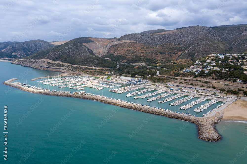 Aerial top-down photo of marina a dock basin with moorings and supplies ...