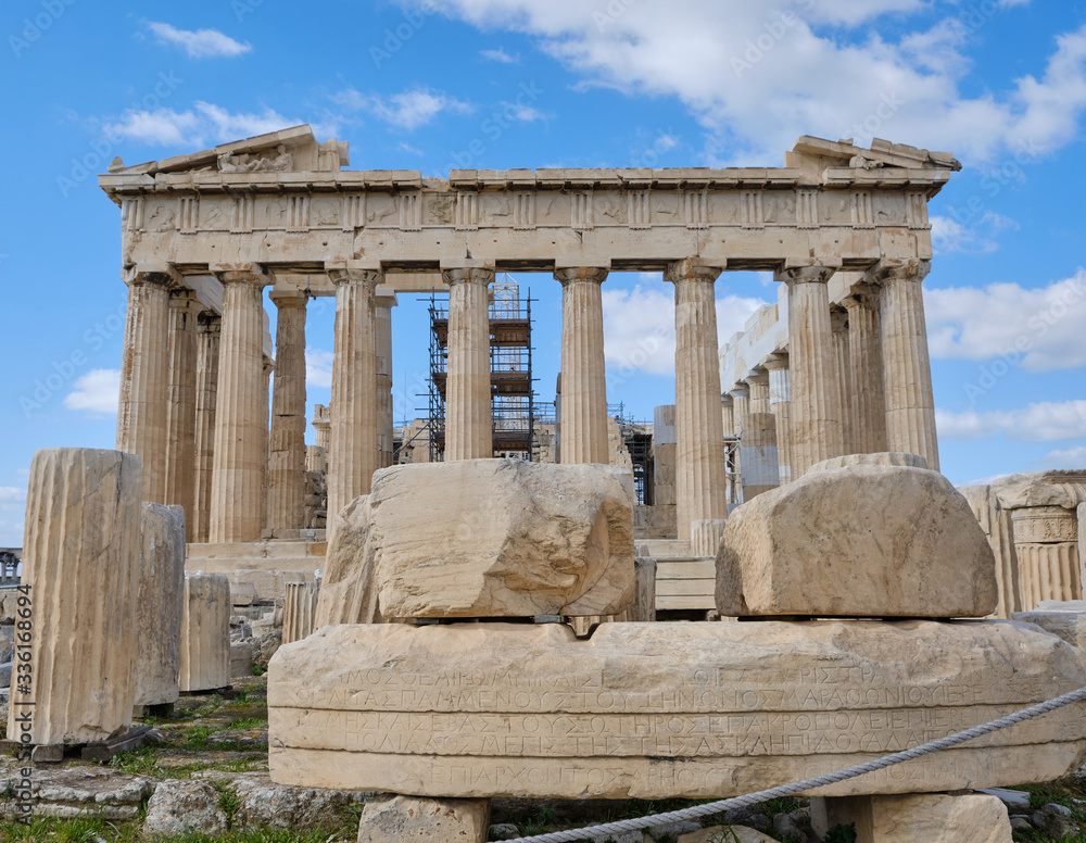 Parthenon. Emblematic temple restored in an archaeological site with ...