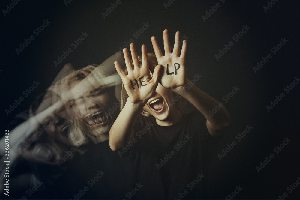 Woman having panic attack on dark background Stock Photo | Adobe Stock