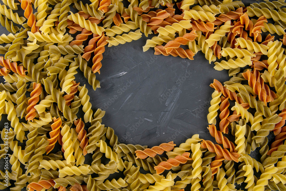 Fusili pasta. Closeup of raw fusilli macaroni in spiral shape with ...