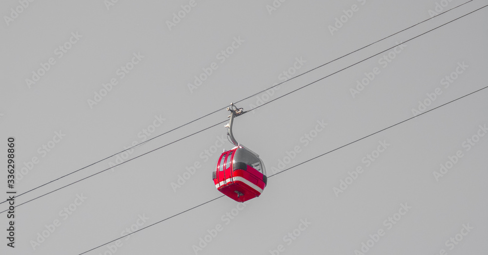 An aerial cable car (telepherique) crossing the Songhua River that ...