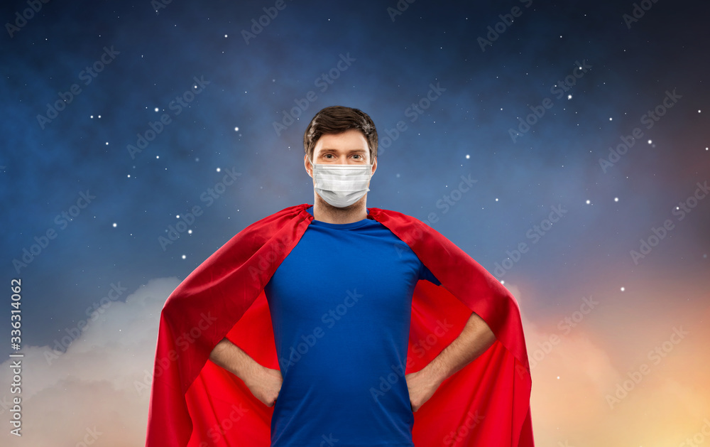 health, safety and pandemic concept - happy young man in red superhero ...