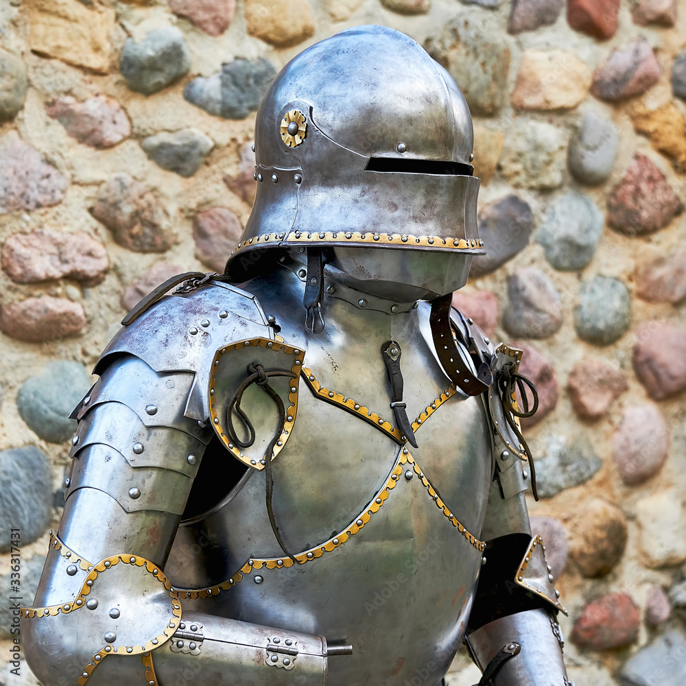Vintage knight medieval suit of armor. Metal armor to protect the ...
