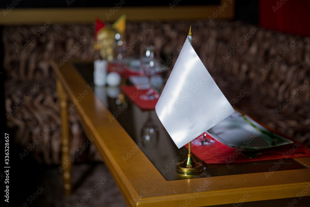 Table Small flag . White flag in the middle . Tooth pick with a small ...