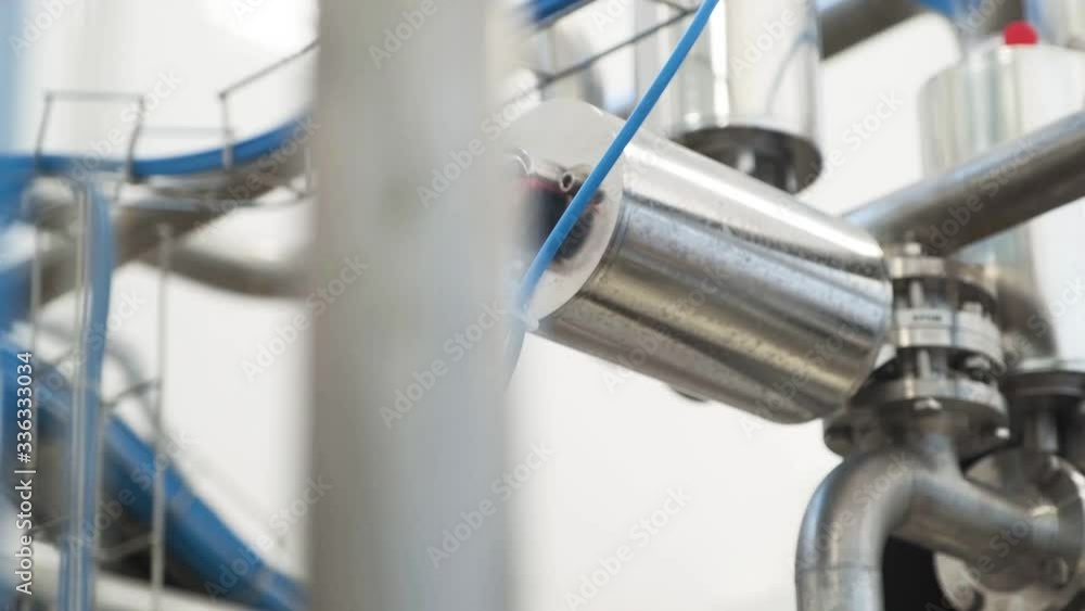 The metal cylinder is mounted on the pipe, on it is a measuring device ...