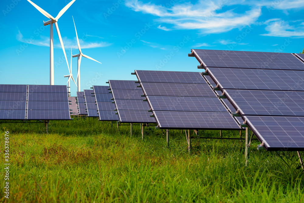 Beautiful Solar panels with wind turbines landscape blue sky with ...