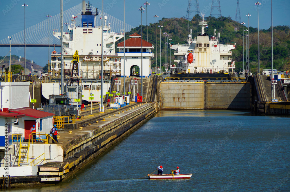 Cargo, container and tanker ships pass through Miraflores Locks in ...