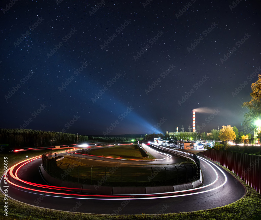 Night racing track with light trails on the racing circuit Stock Photo ...