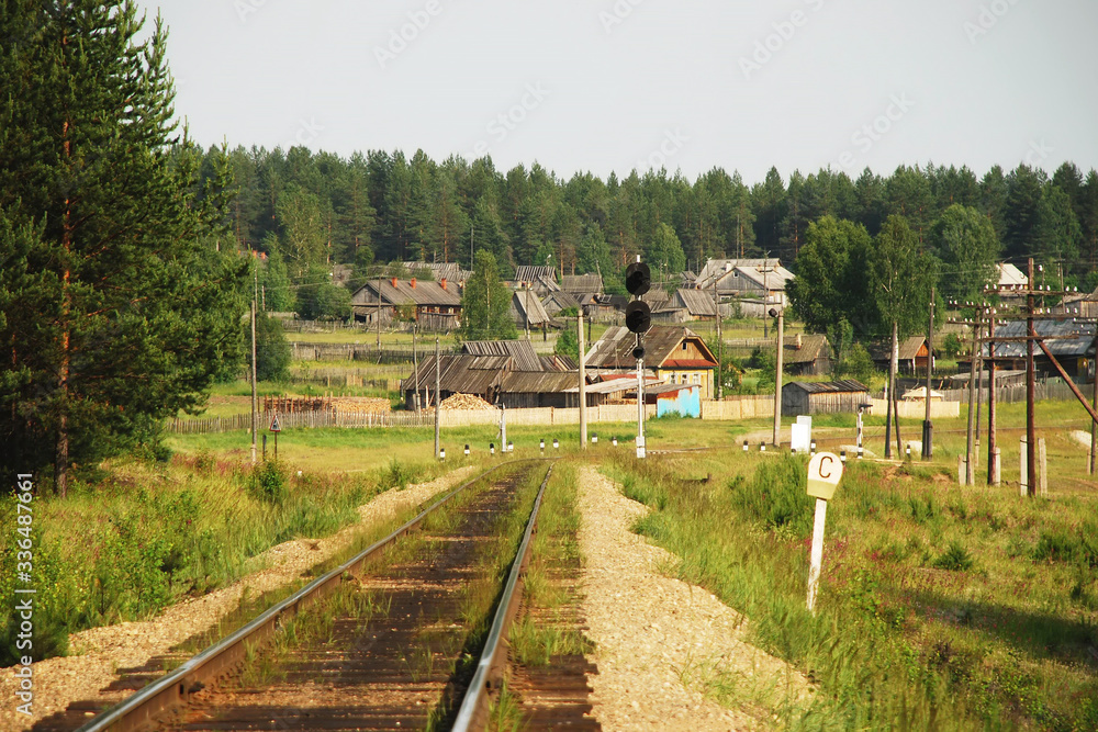 Old Russian railway line and station with half-grown tracks Stock Photo ...
