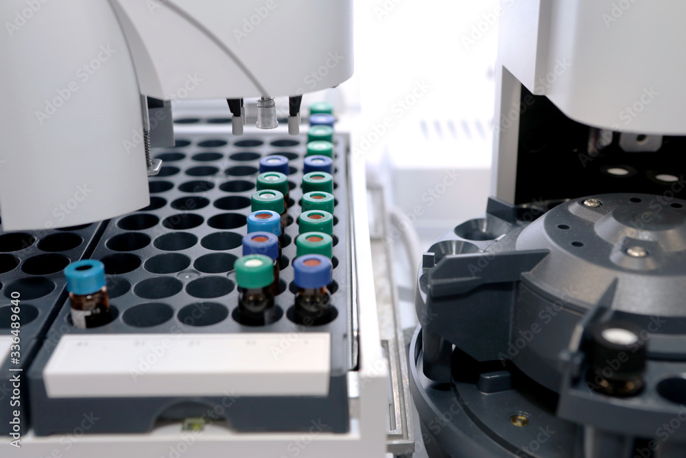 Quality Control Laboratory medicine. Chromatograph operation. makes an ...