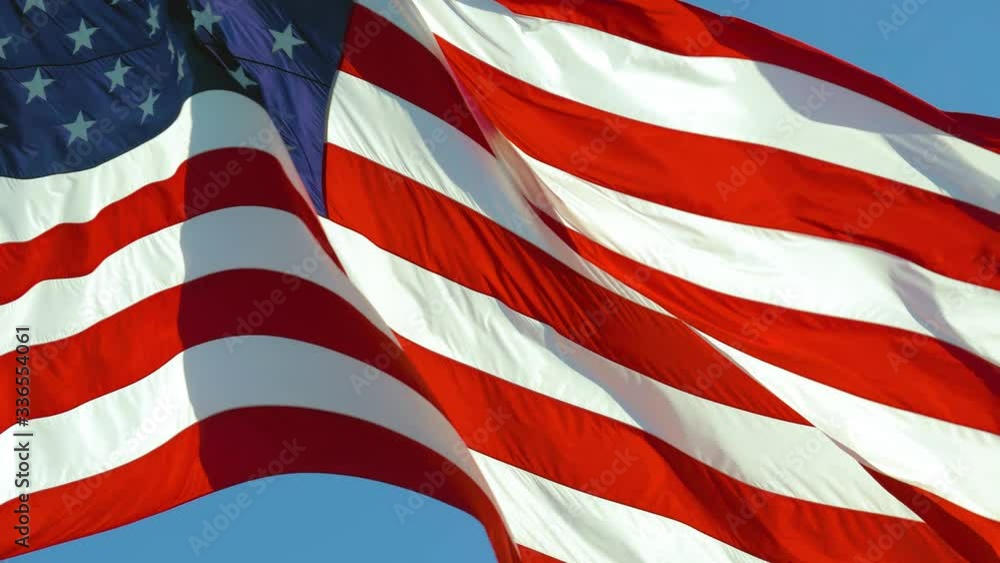 American flag waving in wind, video footage. USA flag flaping in wind ...