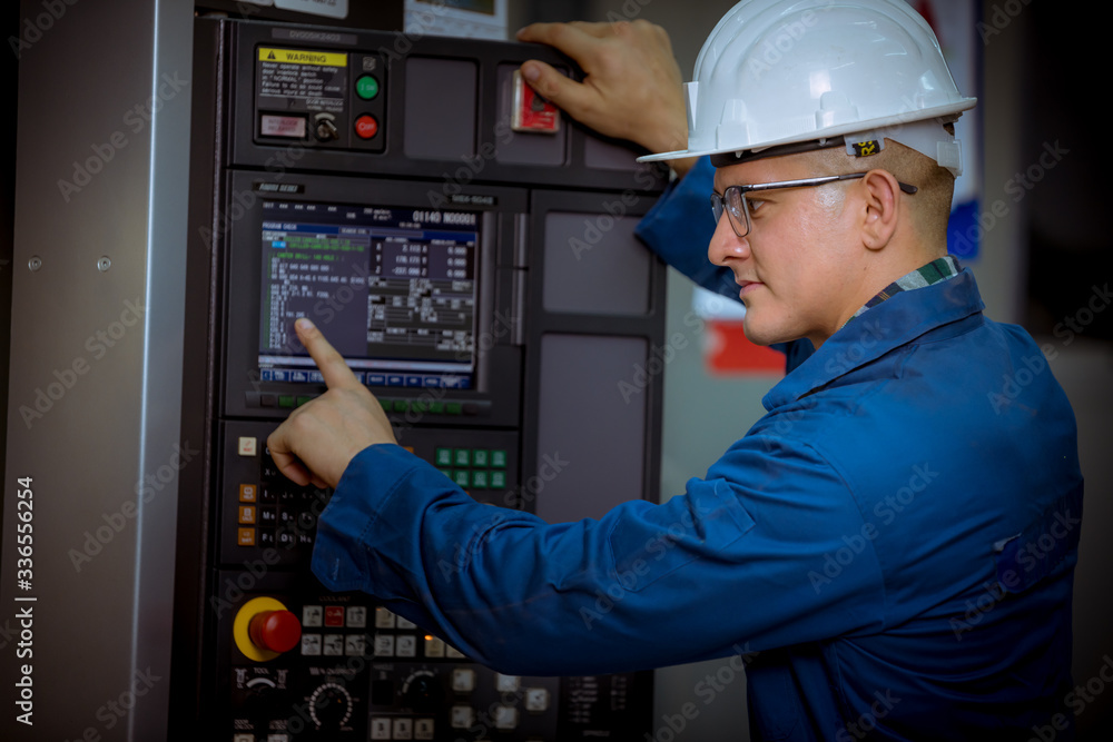 The Industry engineering wearing safety uniform control operating ...