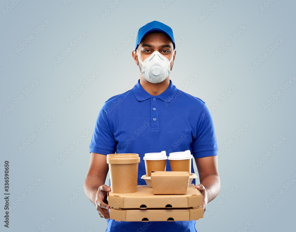health, safety and pandemic concept - indian delivery man wearing face ...