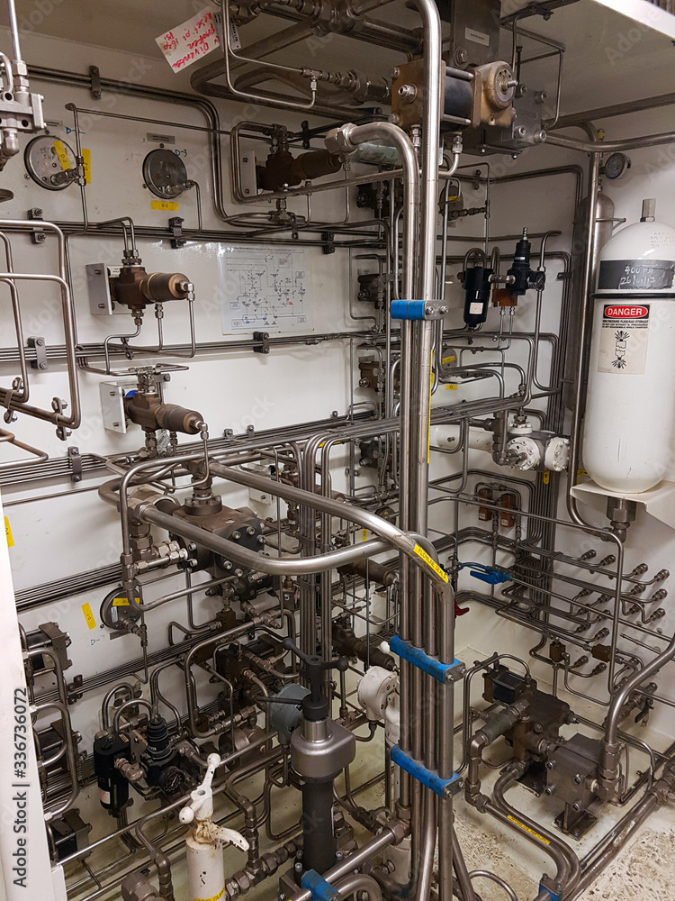Hydraulic panel with loads of stainless steel pipings Stock Photo ...