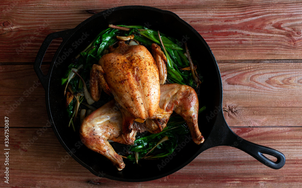 Splayed roast chicken with caramelized ramps, garlic and capers Stock ...
