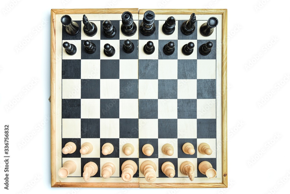 Chess pieces are placed to start the game on the chessboard, above view ...