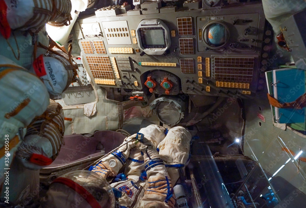 Astronaut in spacesuit in the cockpit of a Russian spacecraft ...