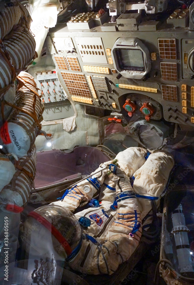 Astronaut in spacesuit in the cockpit of a Russian spacecraft ...