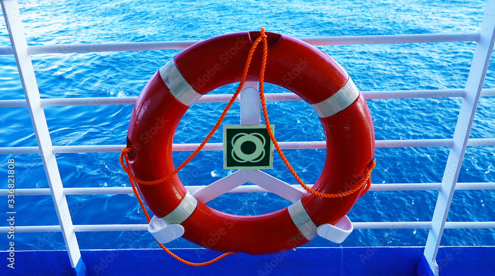 Ship safety equipment, red life buoy Observation deck on a cruise ship ...