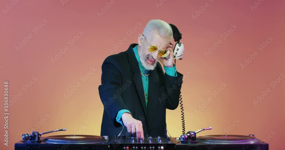 Happy old stylish Caucasian male pensioner in fancy outfit of 70s 80s ...