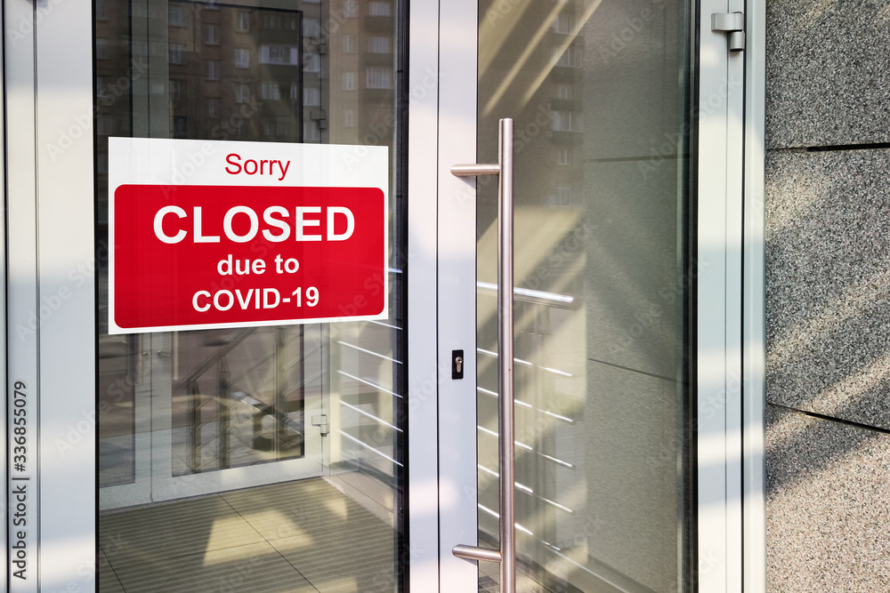 Business center closed due to COVID-19 coronavirus, sign with sorry in ...