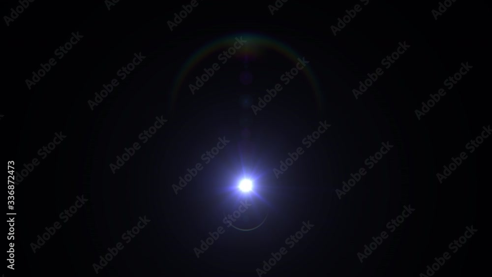 Moving light with lens flare effect isolated on the black background ...