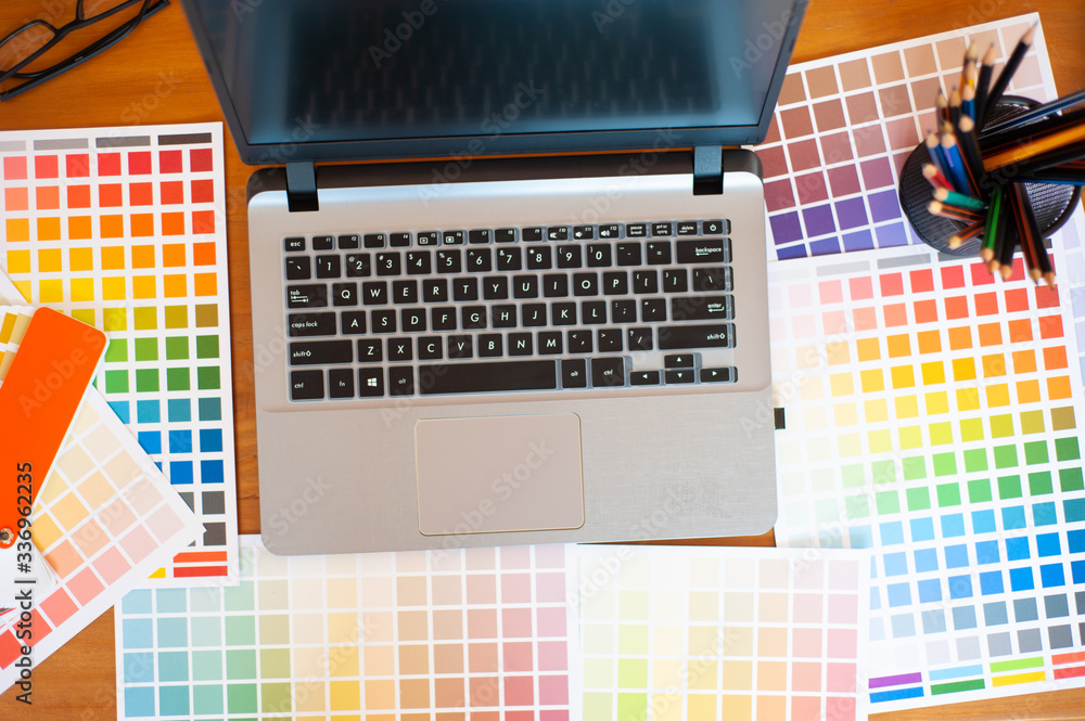 The laptop is equipped with a sample of the color swatch on the ...