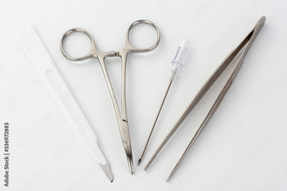 Close up of medical instruments on white background. Instruments is ...