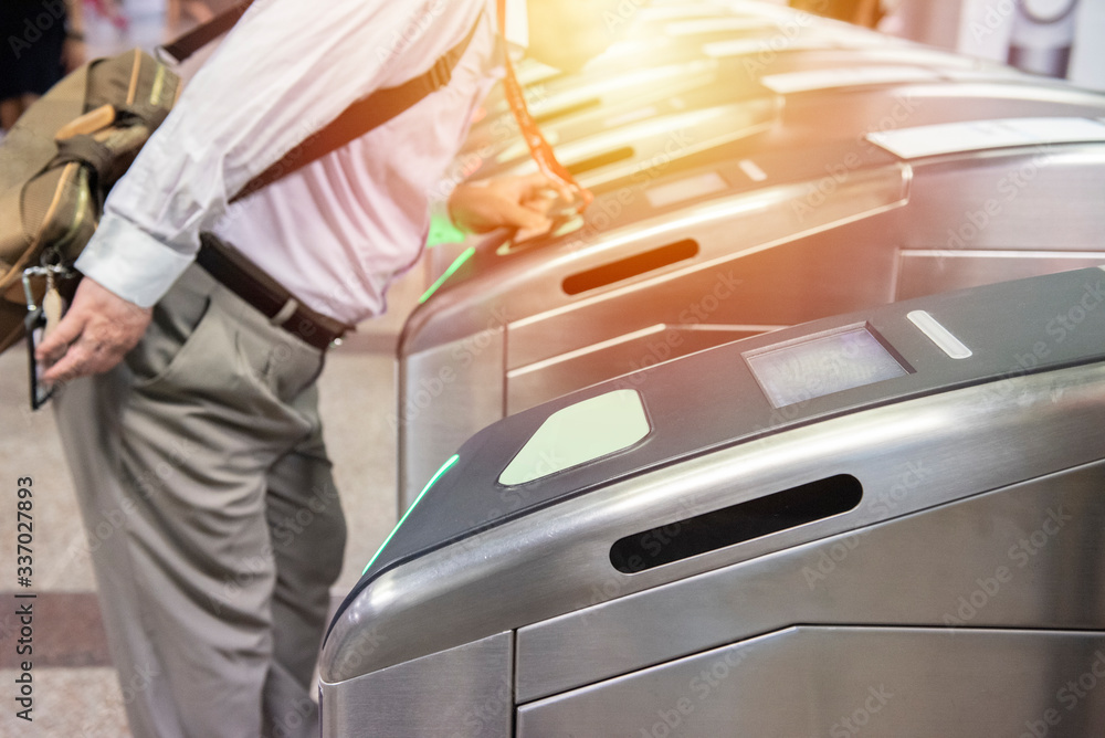 Passenger use ticket card or coin scan passing entrance exit automatic ...