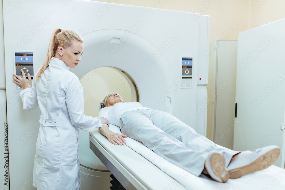 MRI scan procedure of mature female patient! Stock Photo | Adobe Stock