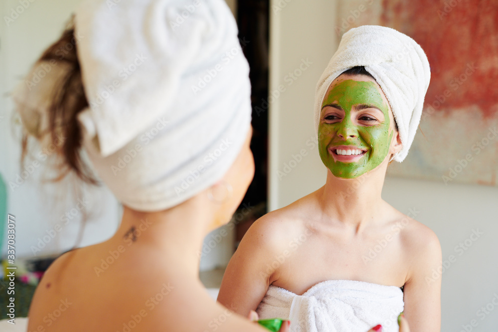 Smiling friends with face masks. Stock Photo | Adobe Stock