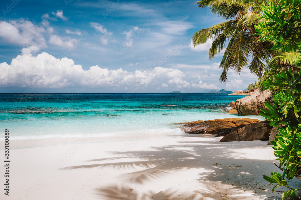 Holiday vacation visiting exotic tropical sandy beach on Mahe Island ...