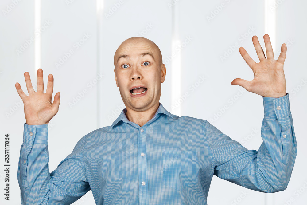 Portrait White bald man in blue shirt got scared and hands up Stock ...