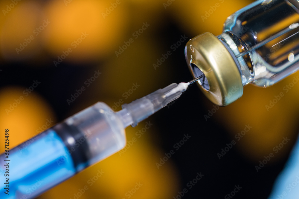 Close up vaccine vial dose flu shot drug needle syringe, medical ...