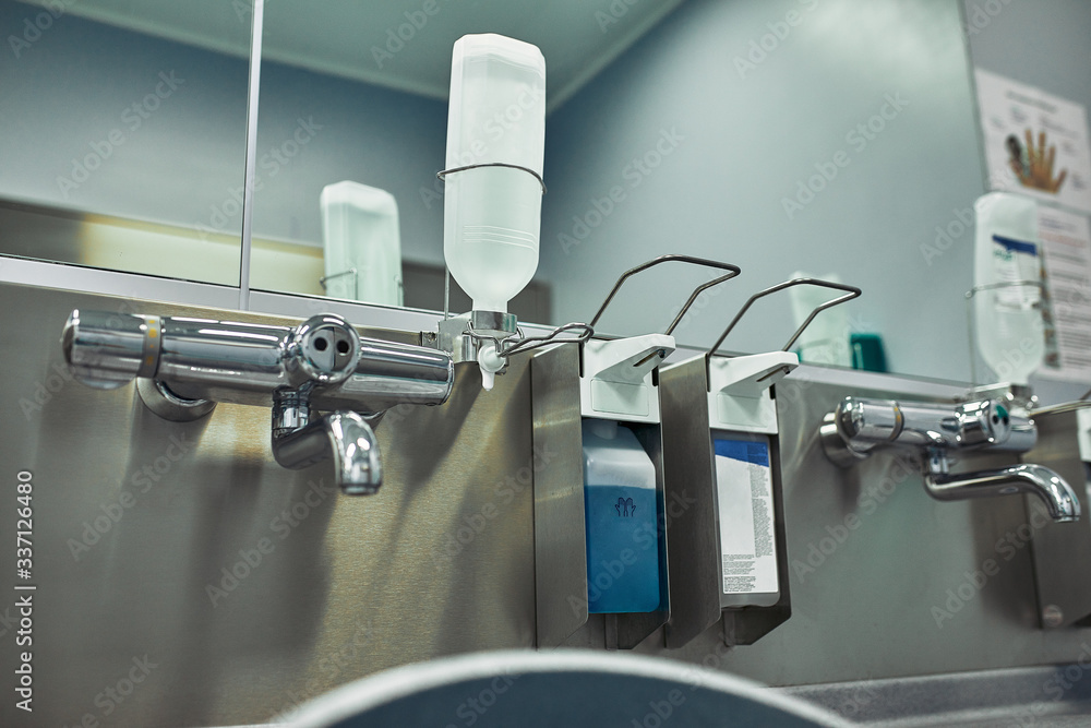 Hand wash room in the hospital. Modern preoperative room for ...